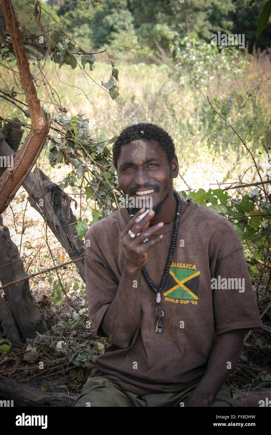 African man smoking, Gambia, Africa Stock Photo - Alamy