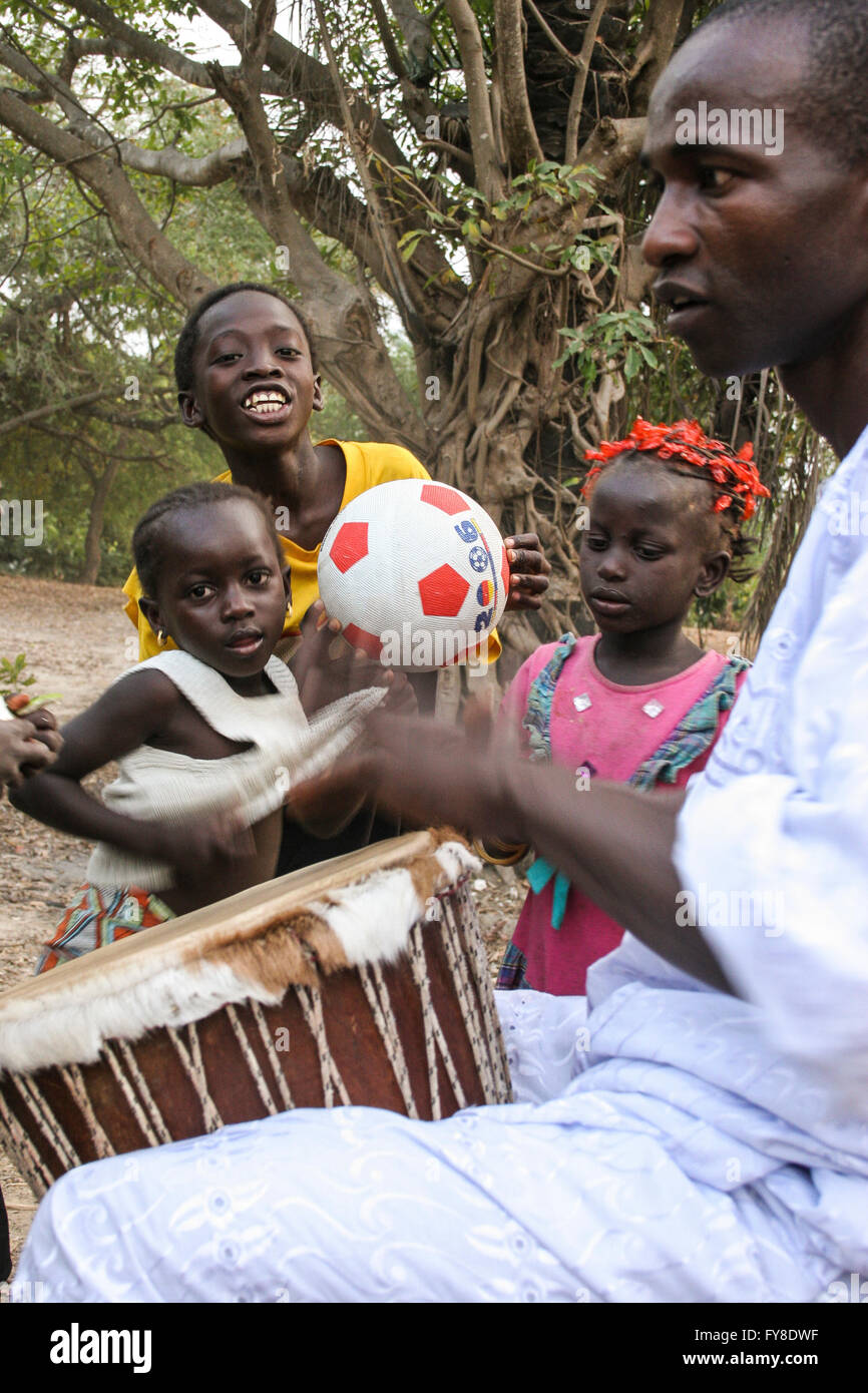 African man playing drums hi-res stock photography and images - Alamy