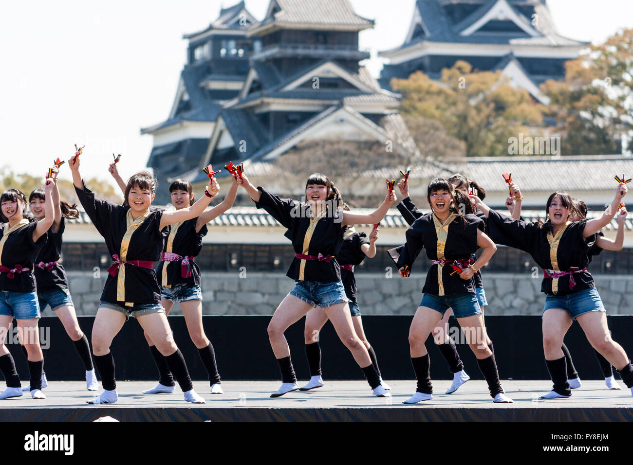 Japanese female dance troupe of teenage girls, holding naruko, dancing ...