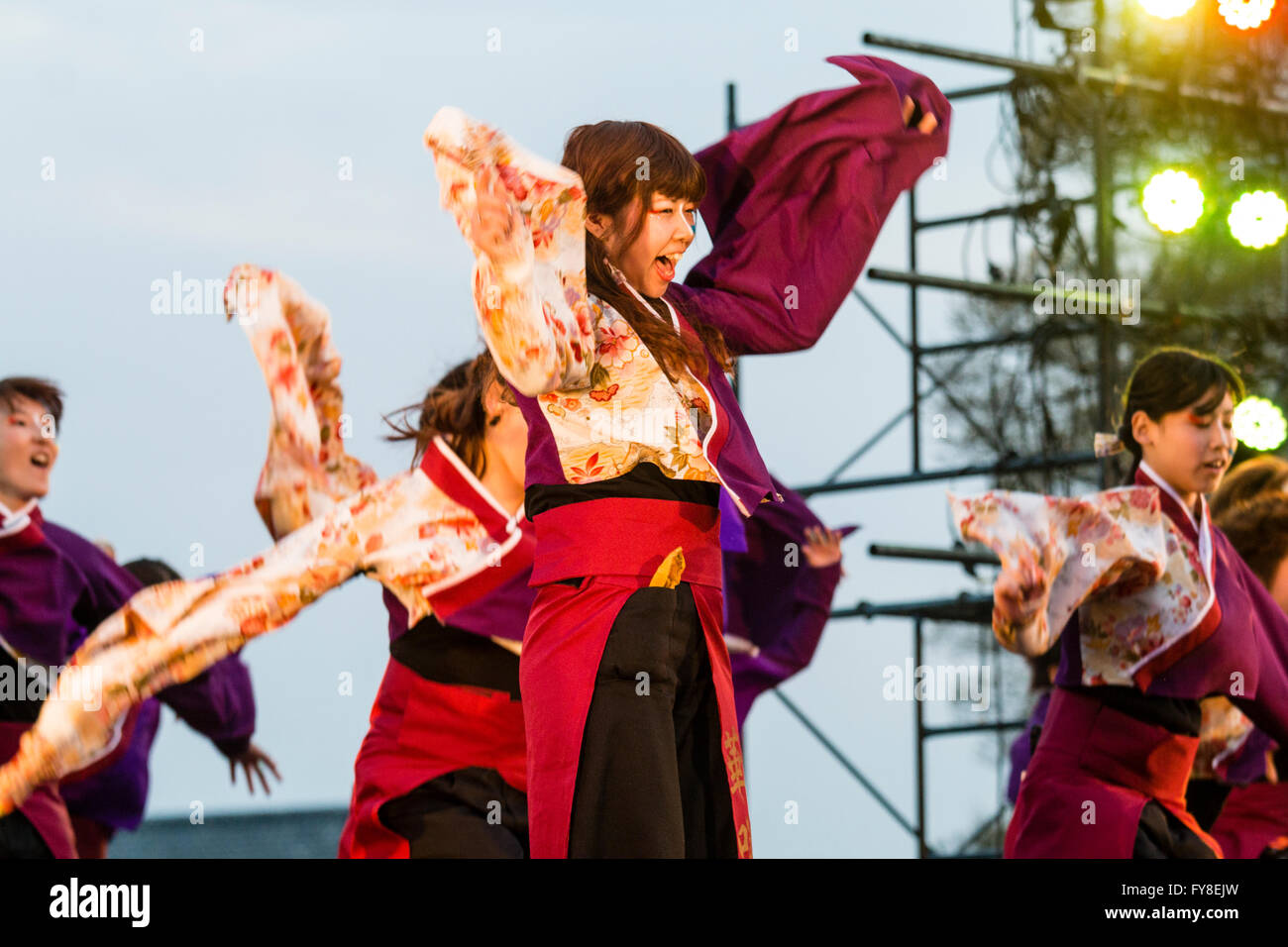 Young Japanese woman with swirling long sleeves, part of dance team ...