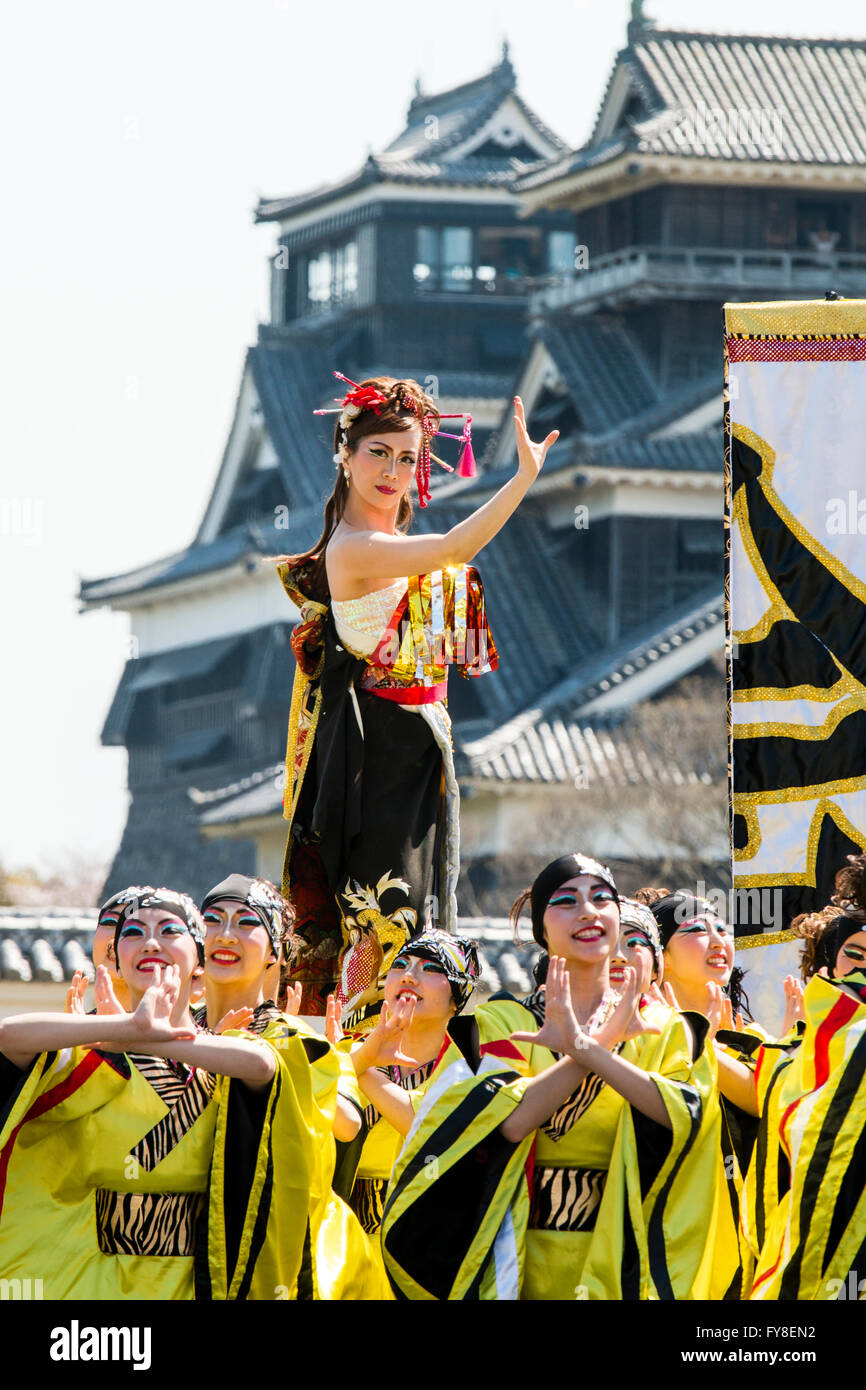 Japanese yosaki festival, female troupe dancing in black and yellow ...