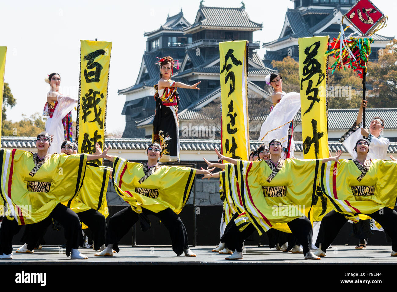 Japanese yosaki festival, female troupe dancing in black and yellow ...