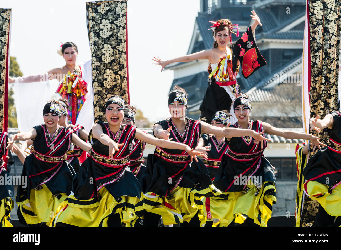 Japanese yosaki festival, female troupe dancing in black and yellow ...