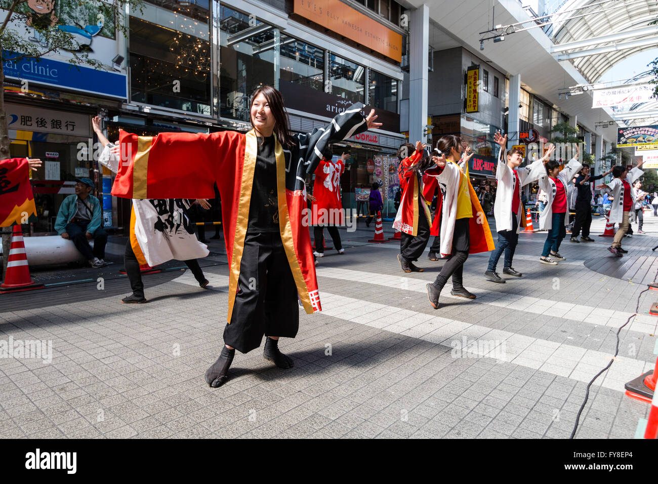 Japanese young female dance troupe, wearing yukata jackets, dancing in ...