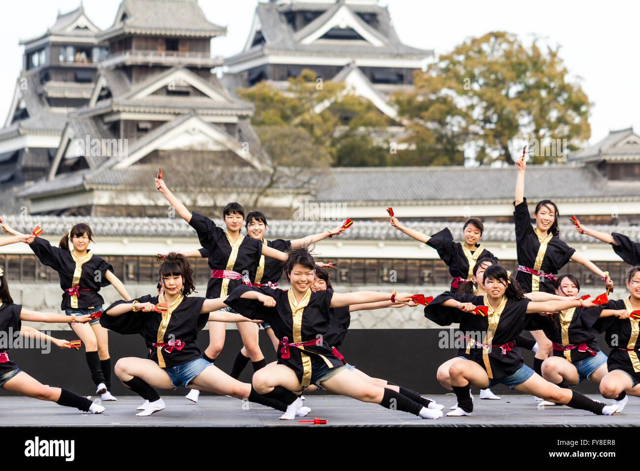 Japanese female dance troupe of teenage girls, holding naruko, dancing ...