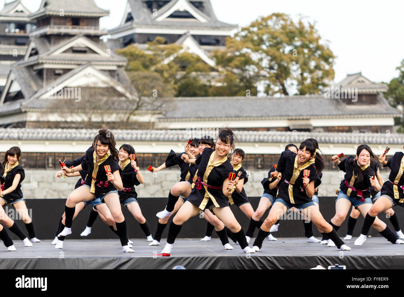 Japanese female dance troupe of teenage girls, holding naruko, dancing ...