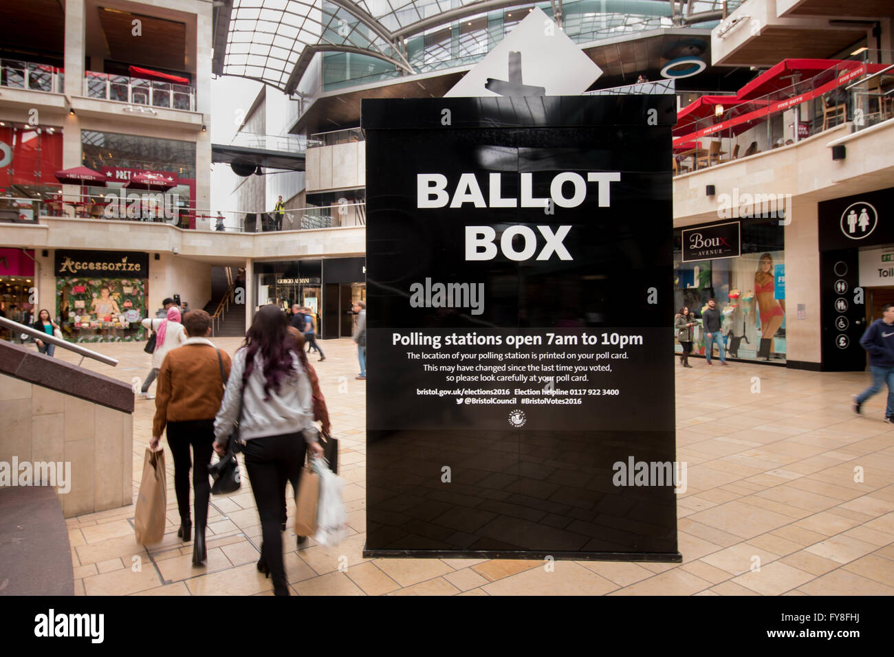 People walking past a giant ballot box in Bristols Cabot Circus ...