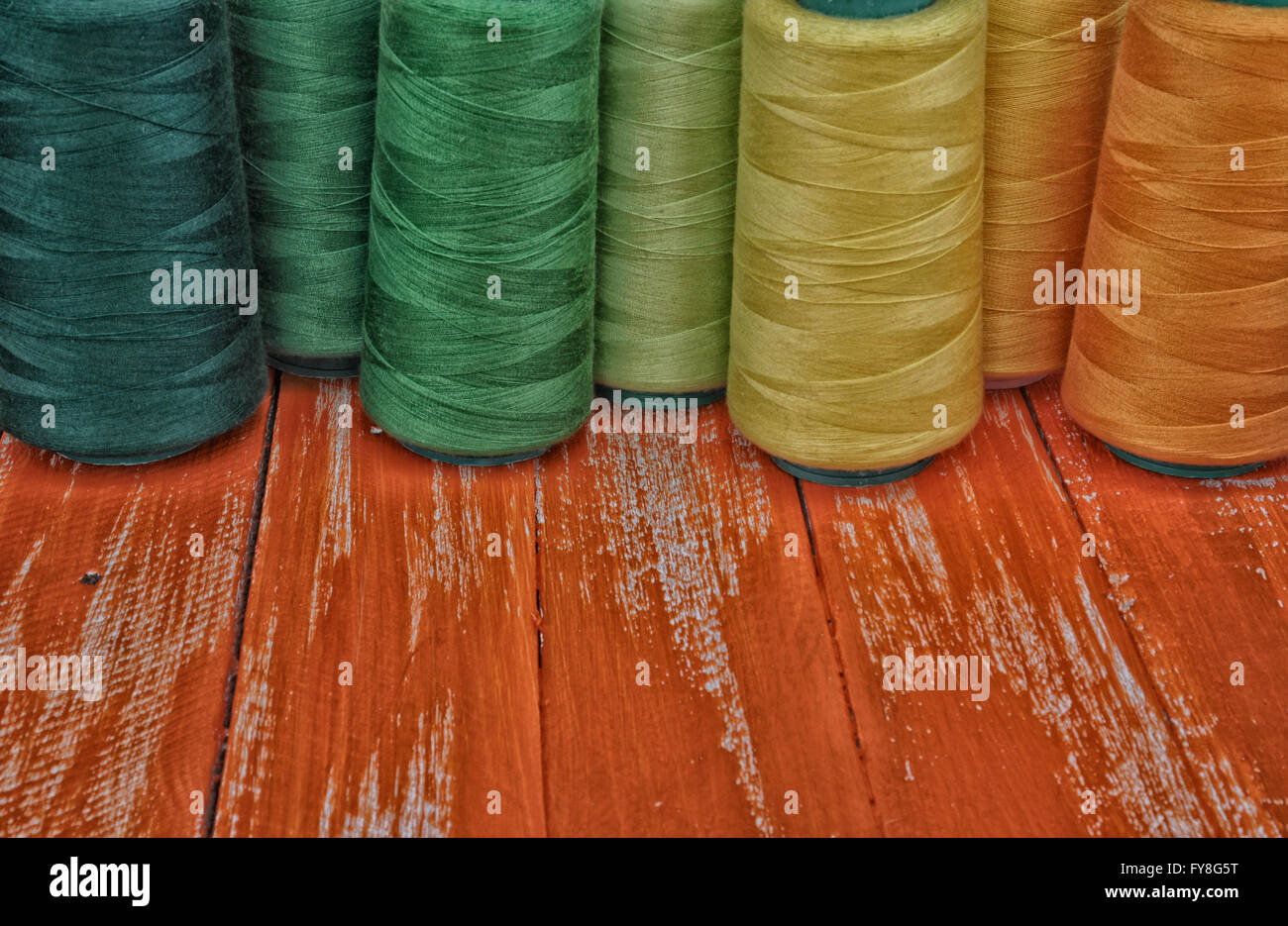 Vintage photo threads for sewing and embroidery in orange tones on the ...