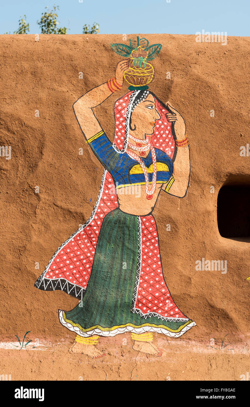Traditional painting on a clay wall in rural Rajasthan, Shilpgram ...