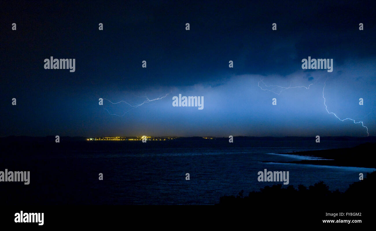 Dramatic lightning strikes, Killyleagh village, seen across Strangford ...