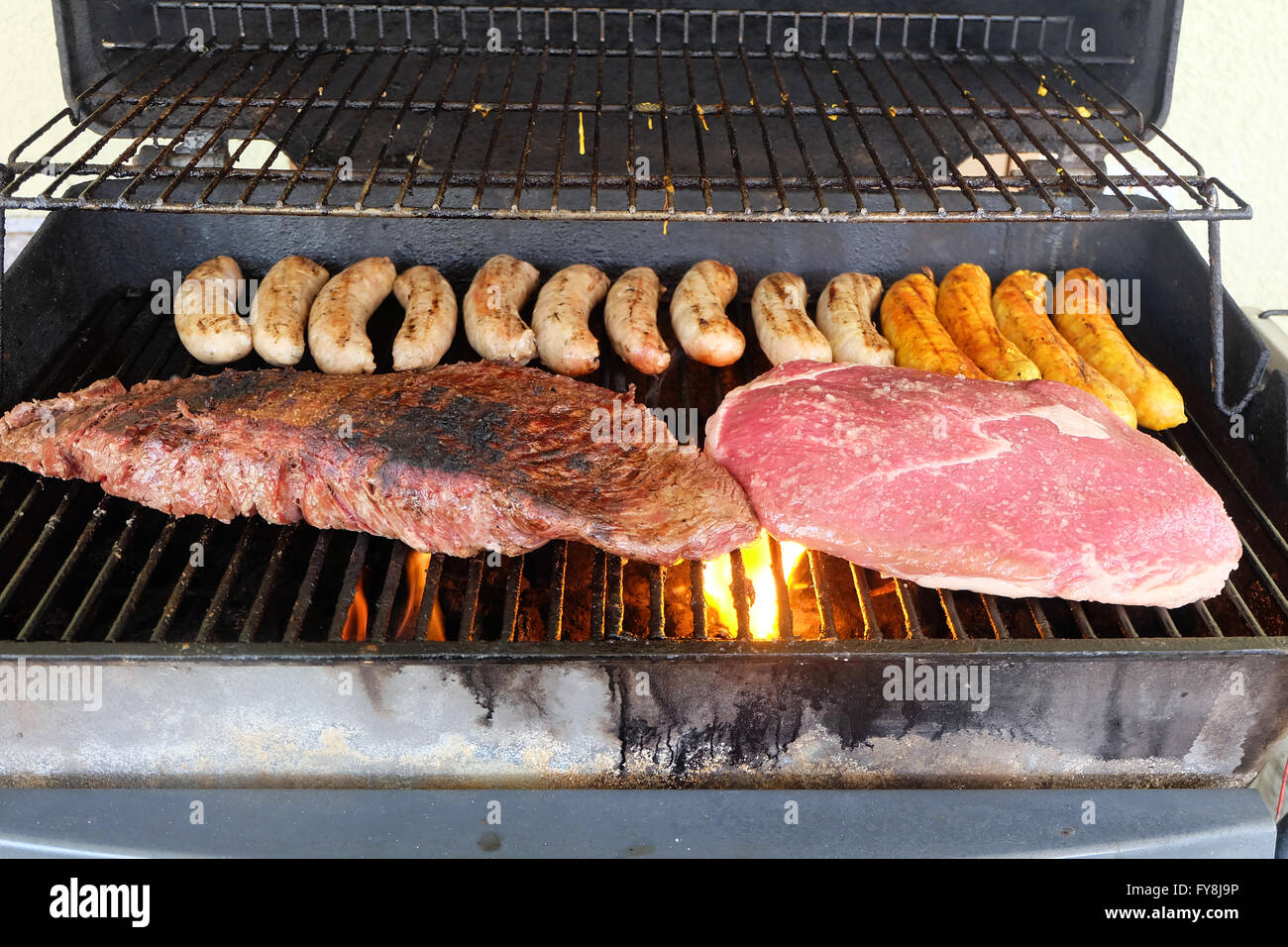 Different views of food prepared on a BBQ Stock Photo - Alamy