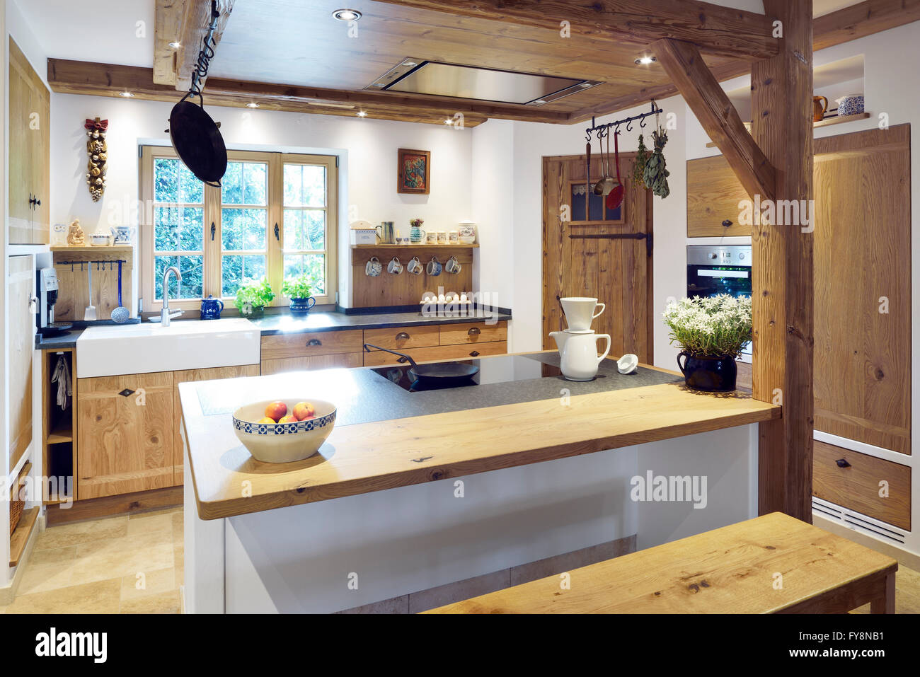 Rustic country style home with kitchen island Stock Photo - Alamy