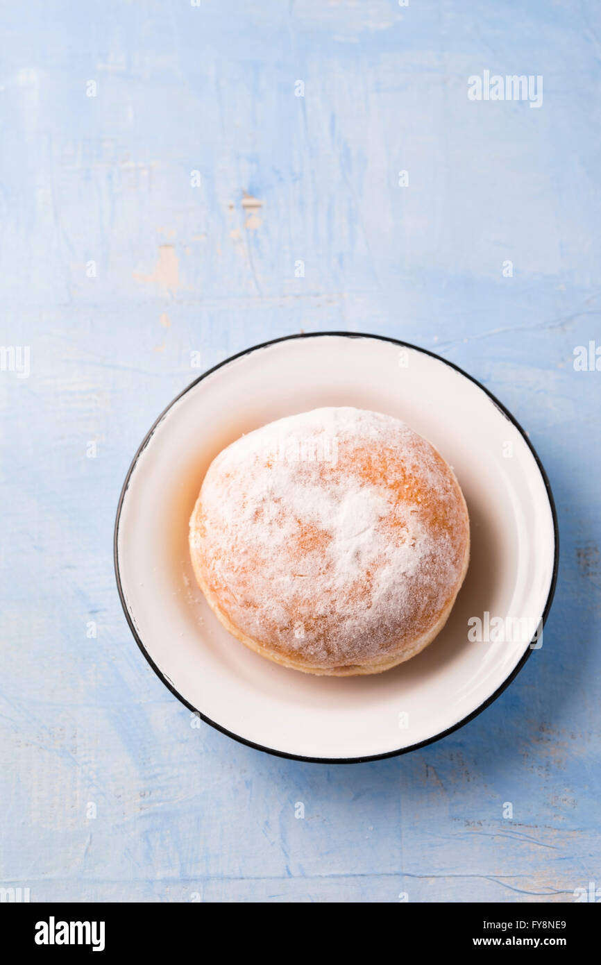 Berliner on plate, copy-space Stock Photo - Alamy