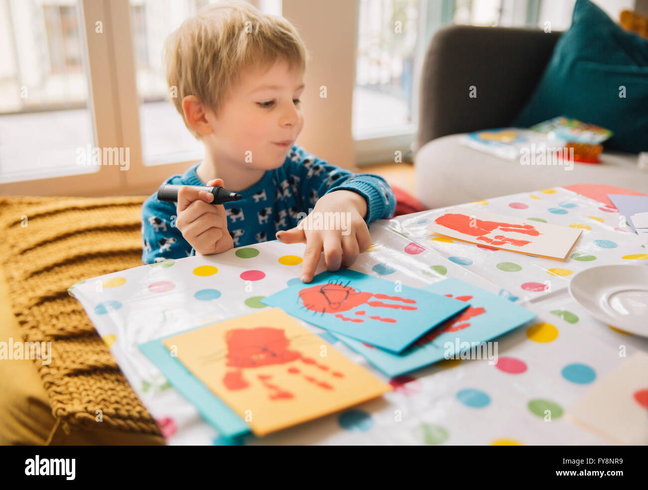 Little Boy Creating Easter Cards With Handprints At Home Stock Photo Alamy little-boy-creating-easter-cards-with-handprints-at-home-stock-photo-alamy