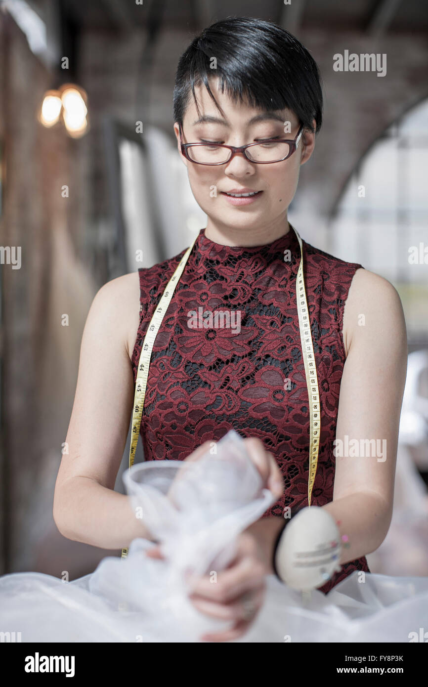 Wedding dress designer working Stock Photo - Alamy