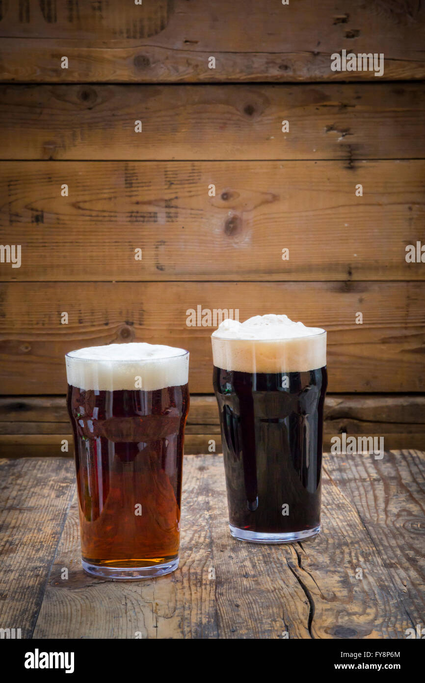 Stout and Red Ale in pint glasses Stock Photo - Alamy