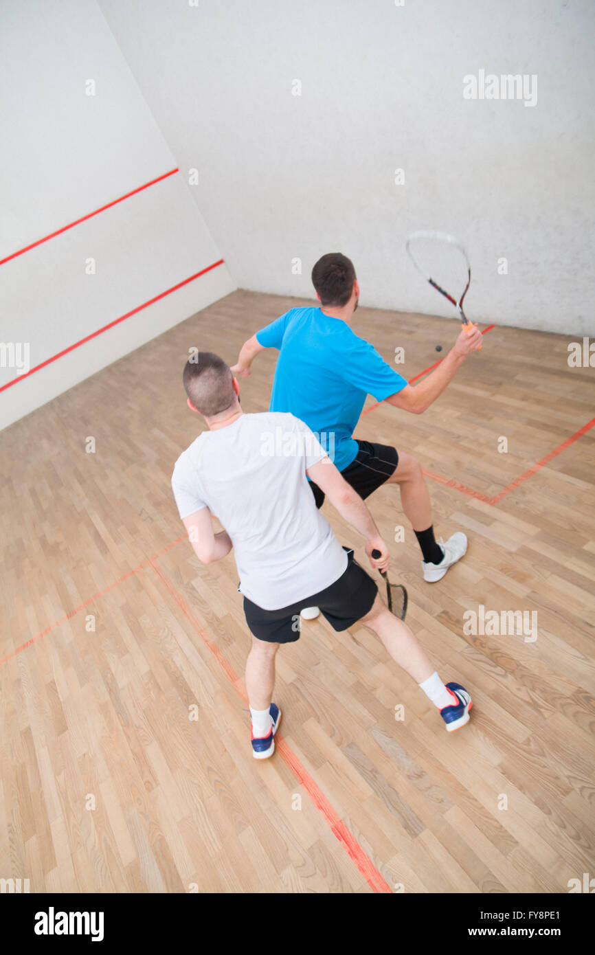Squash, men playing squash Stock Photo - Alamy