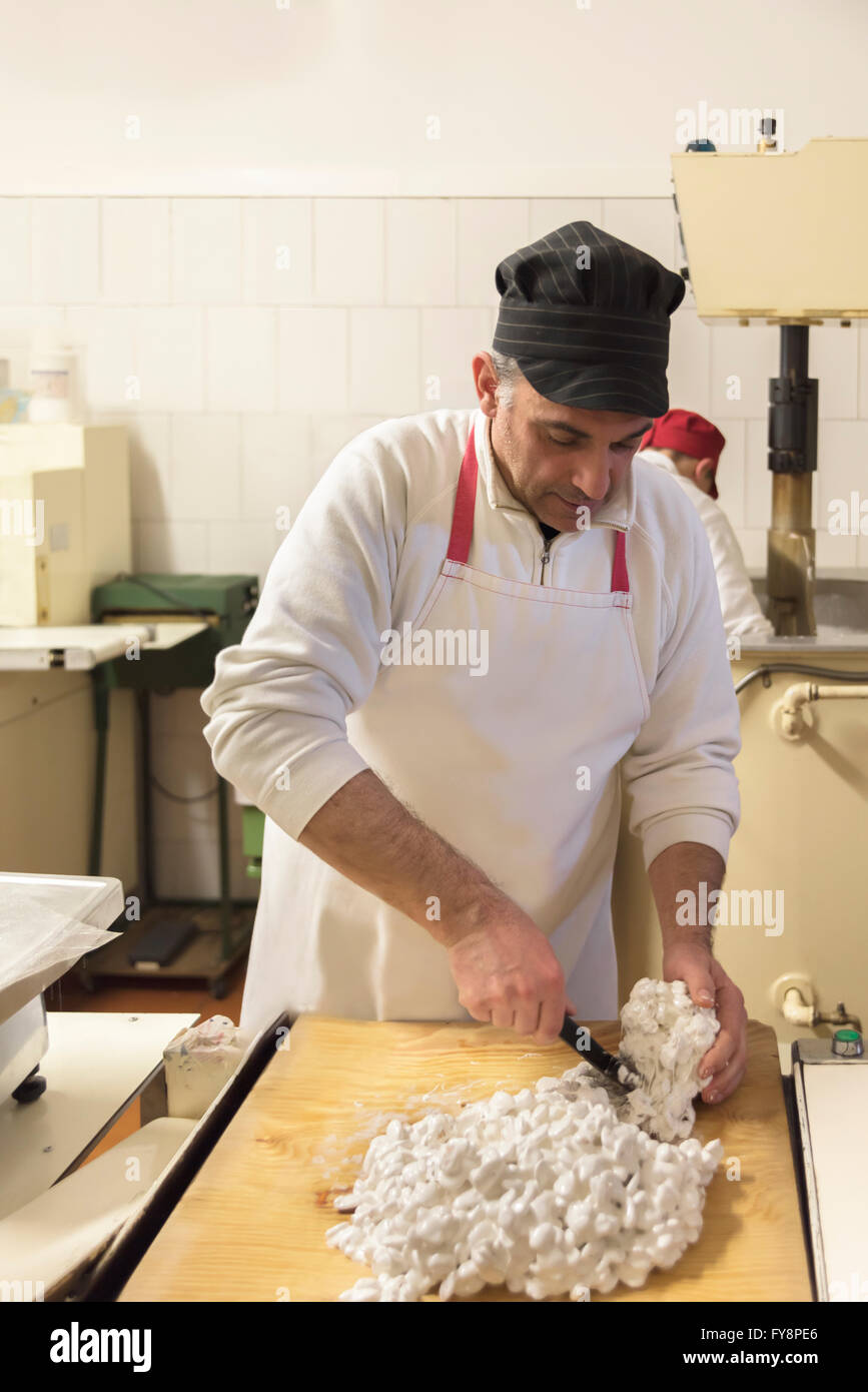 Italy, Manufacturing of traditional torrone in confectionery, ownder ...