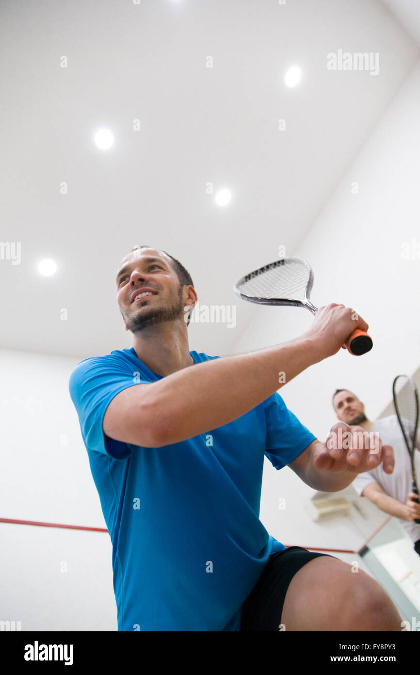 Squash, men playing squash Stock Photo - Alamy