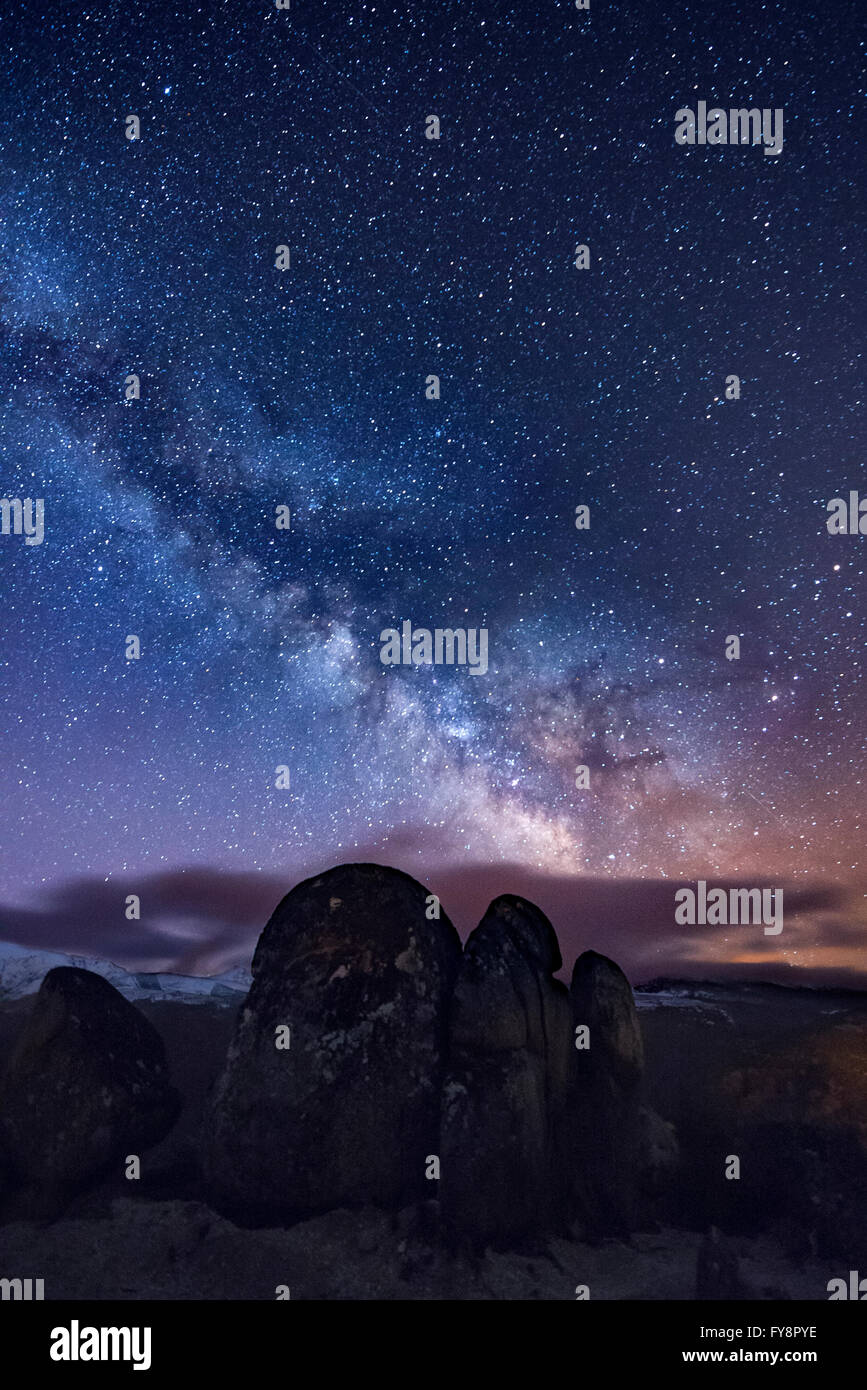 Milky way over ancient granite rocks Stock Photo - Alamy