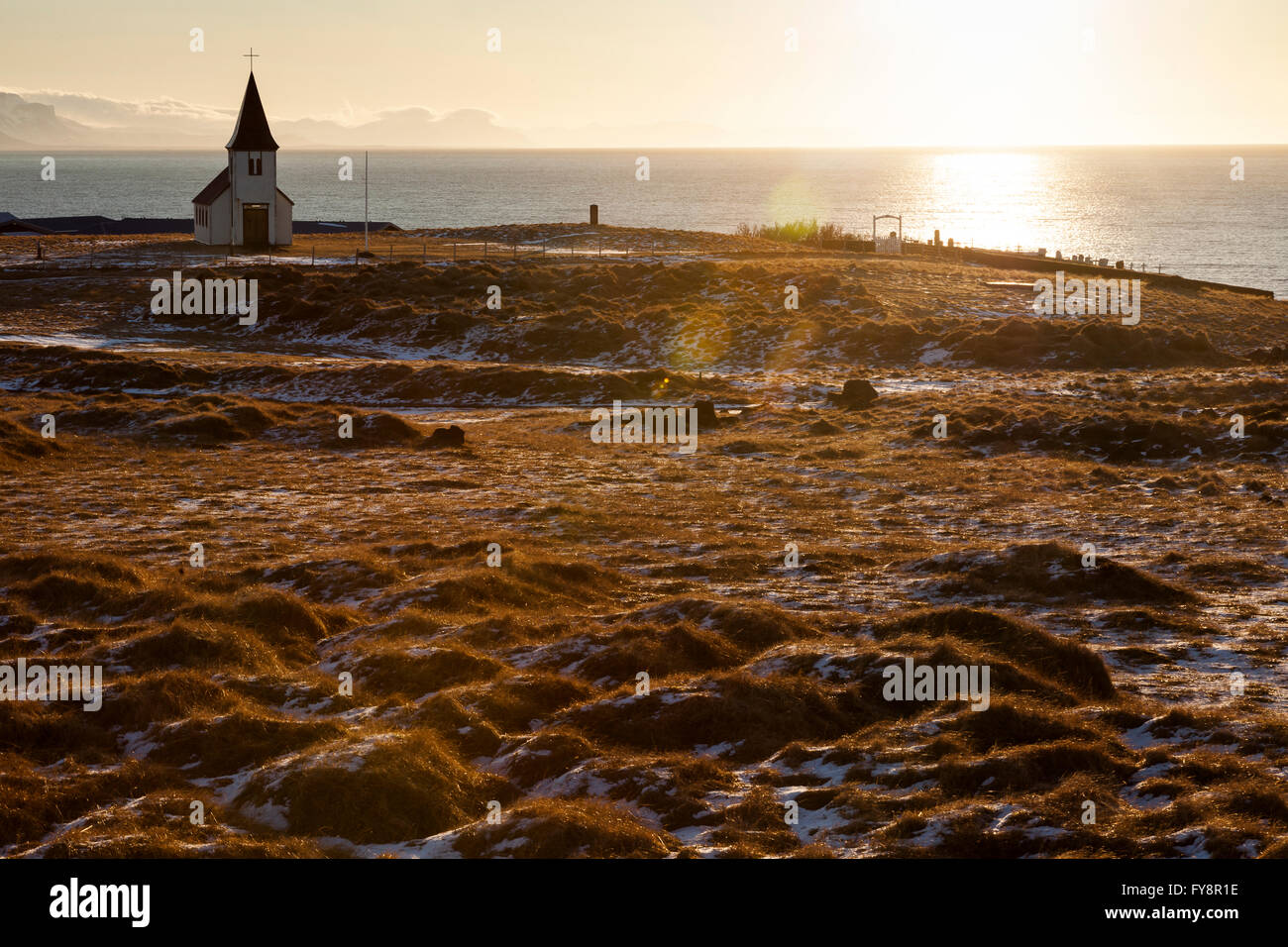 Iceland, Snaefells, Hellnar, view to church at backlight Stock Photo ...
