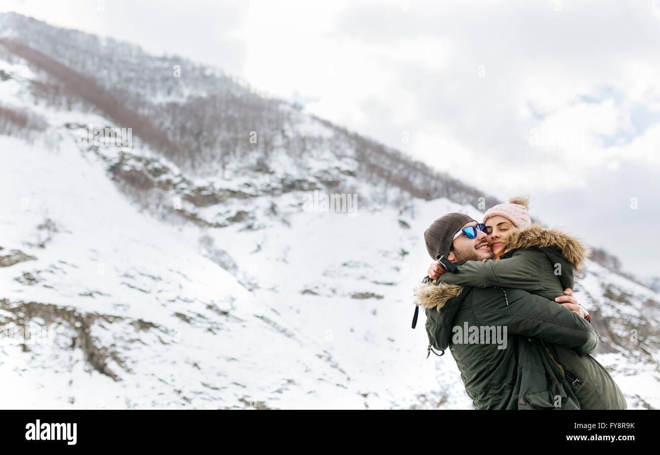 Spain, Asturias, couple hugging each other in the snowy mountains Stock ...