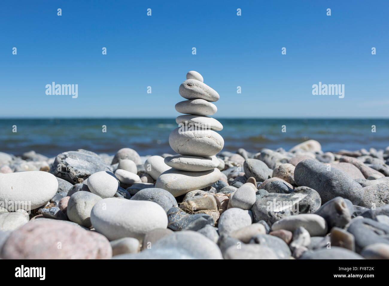 Stack of pebbles on stony beach Stock Photo - Alamy