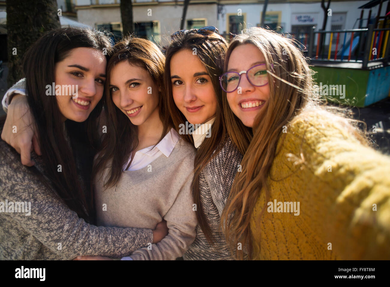 Four smiling young women taking a selfie Stock Photo - Alamy Four smiling young women taking a selfie Stock Photo - Alamy