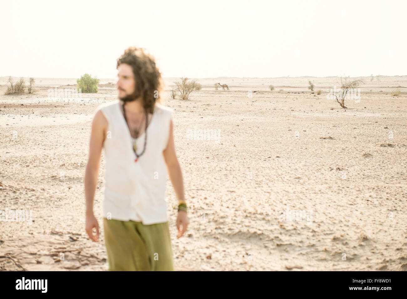 Man standing in the desert alone hi-res stock photography and images ...
