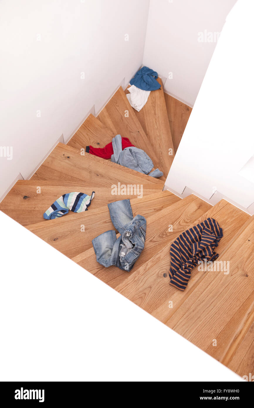 Clothing lying on wooden steps Stock Photo - Alamy