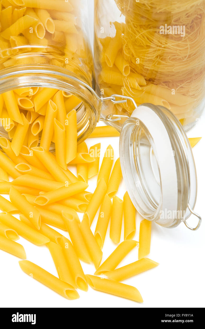 pasta in glass can on a white background Stock Photo - Alamy