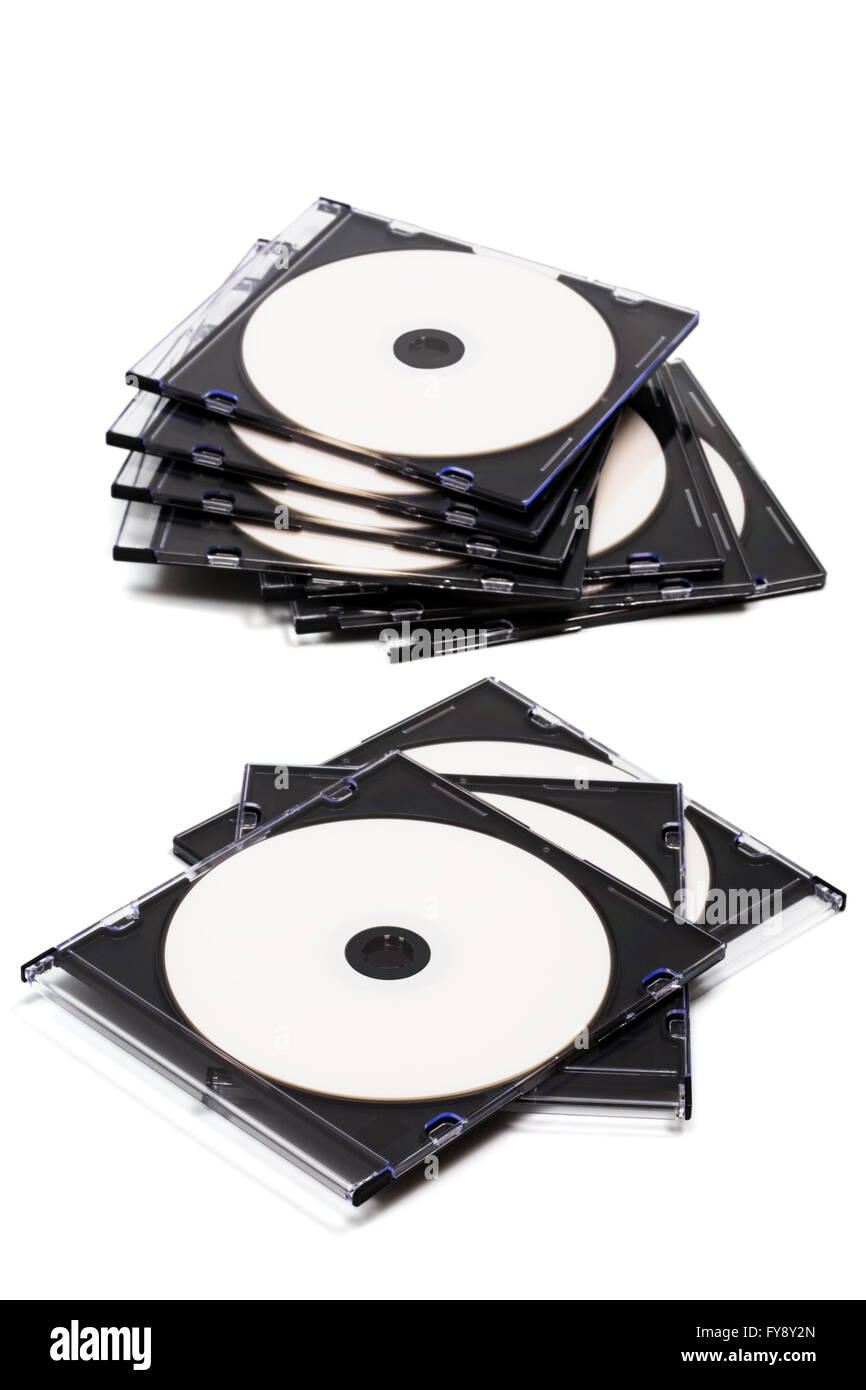 Disk cd in boxes on a white background Stock Photo - Alamy
