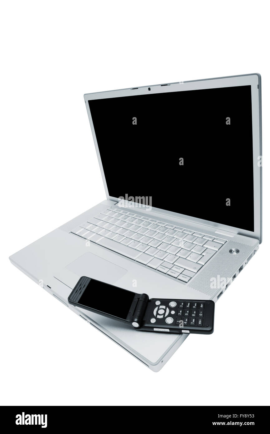 Mobile phone on the keyboard of a laptop Stock Photo - Alamy