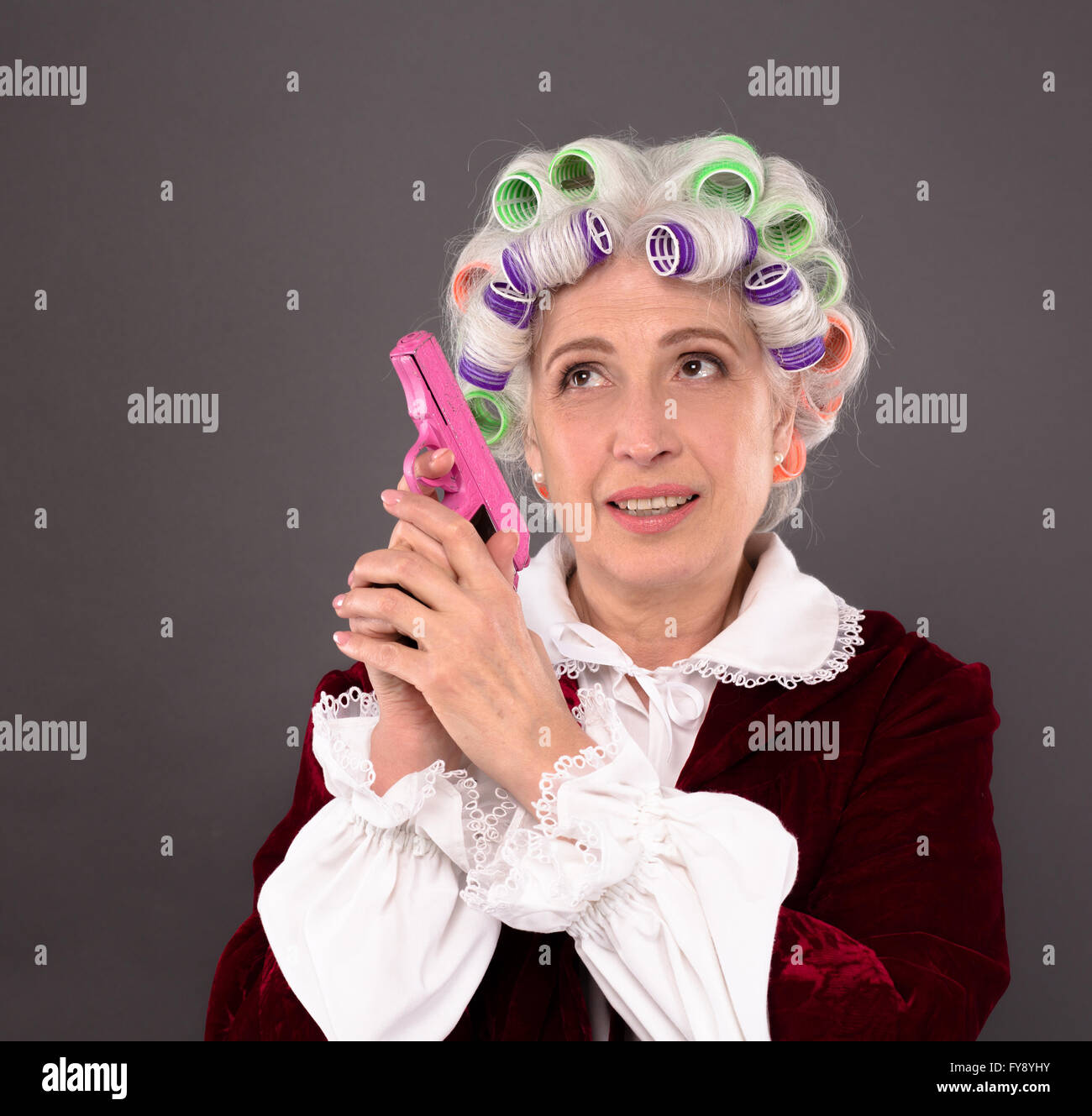 Grandmother with gun Stock Photo - Alamy