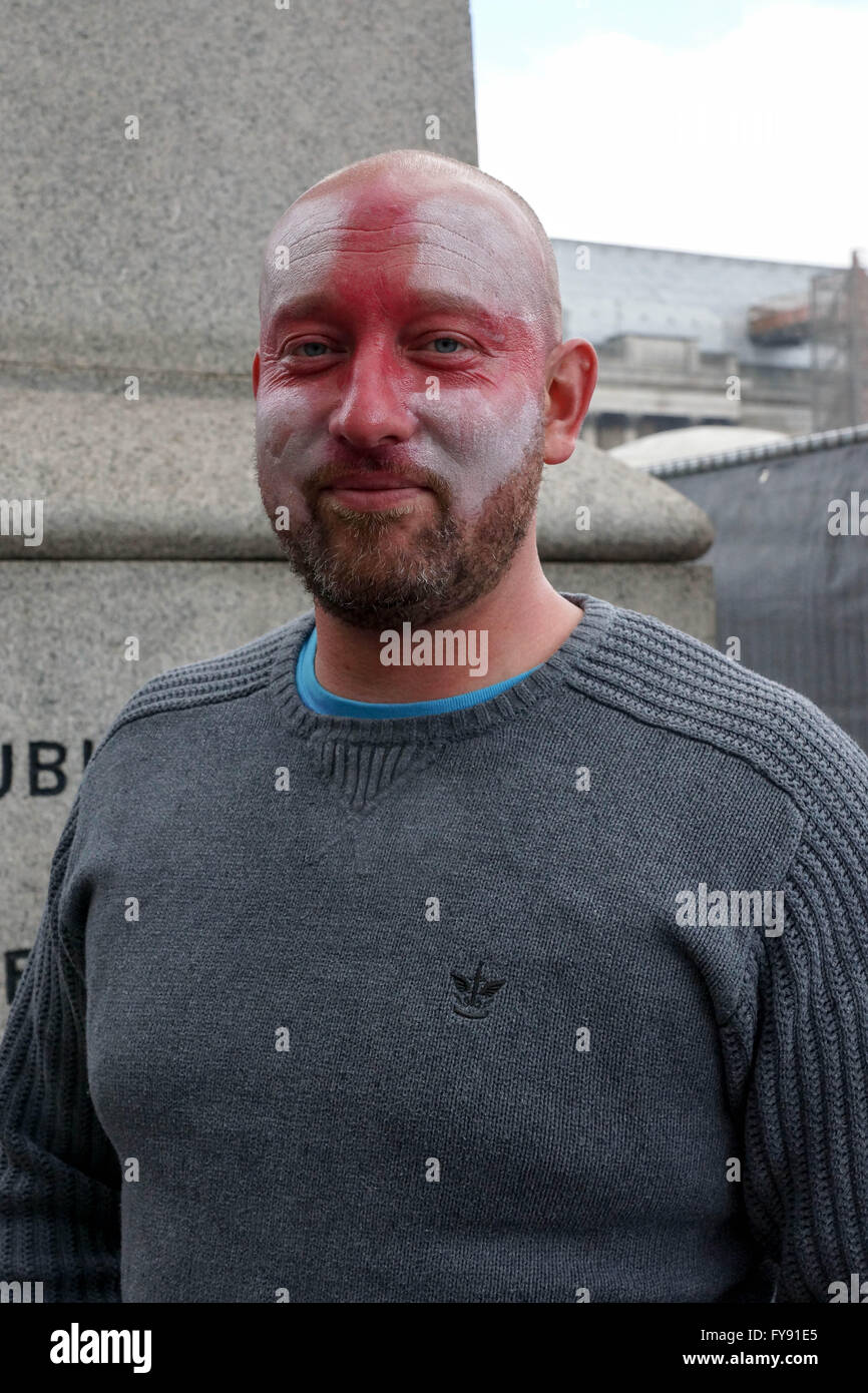 London, England. 23 April 2016. An Englishman with his face painted in ...