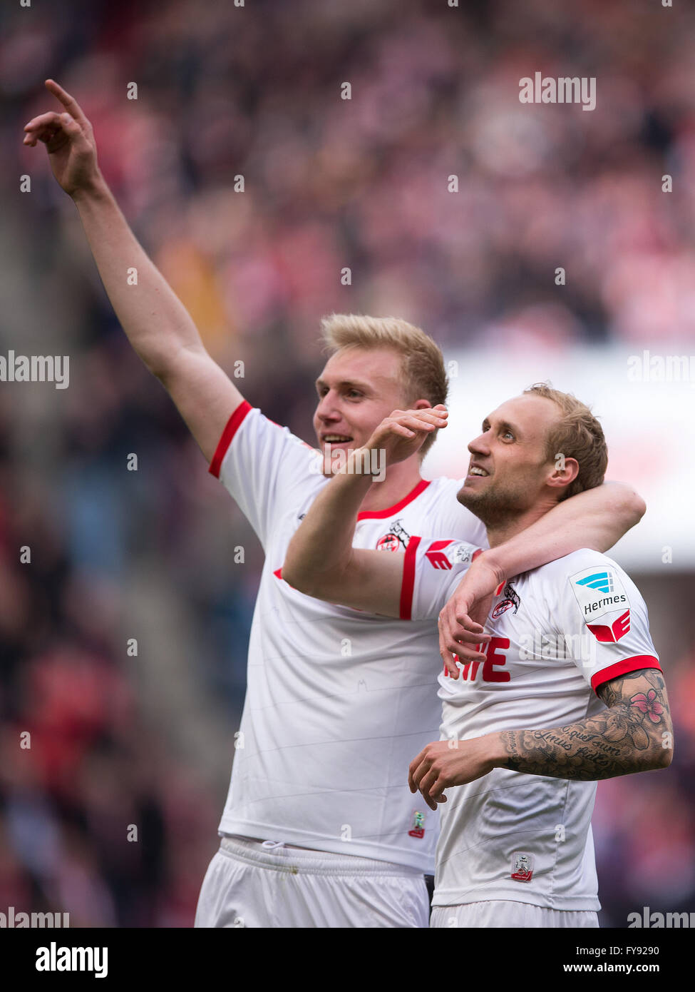 Cologne, Germany. 23rd Apr, 2016. Cologne's Marcel Risse (r) and ...