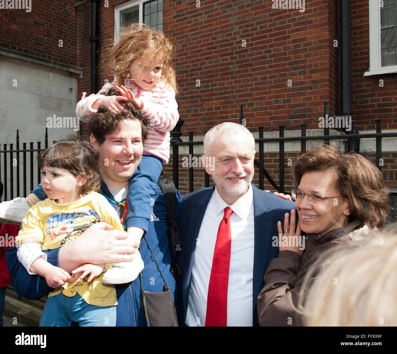 London, UK, 23rd Apr, 2016. Jeremy Corbyn with a family for a photo ...