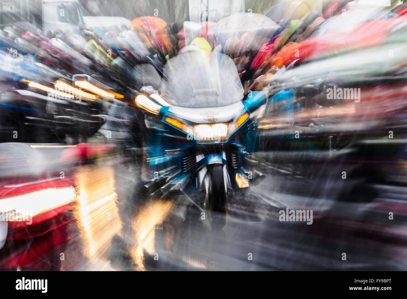 Motorcyclists drive in a procession through the town of Kulmbach ...