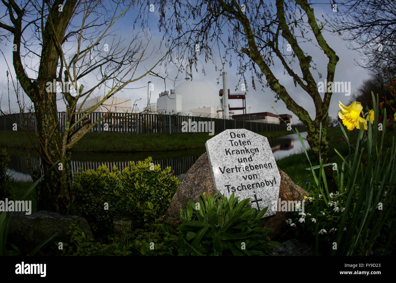 A memorial stone that reads 'To the dead, sick and displaced of ...