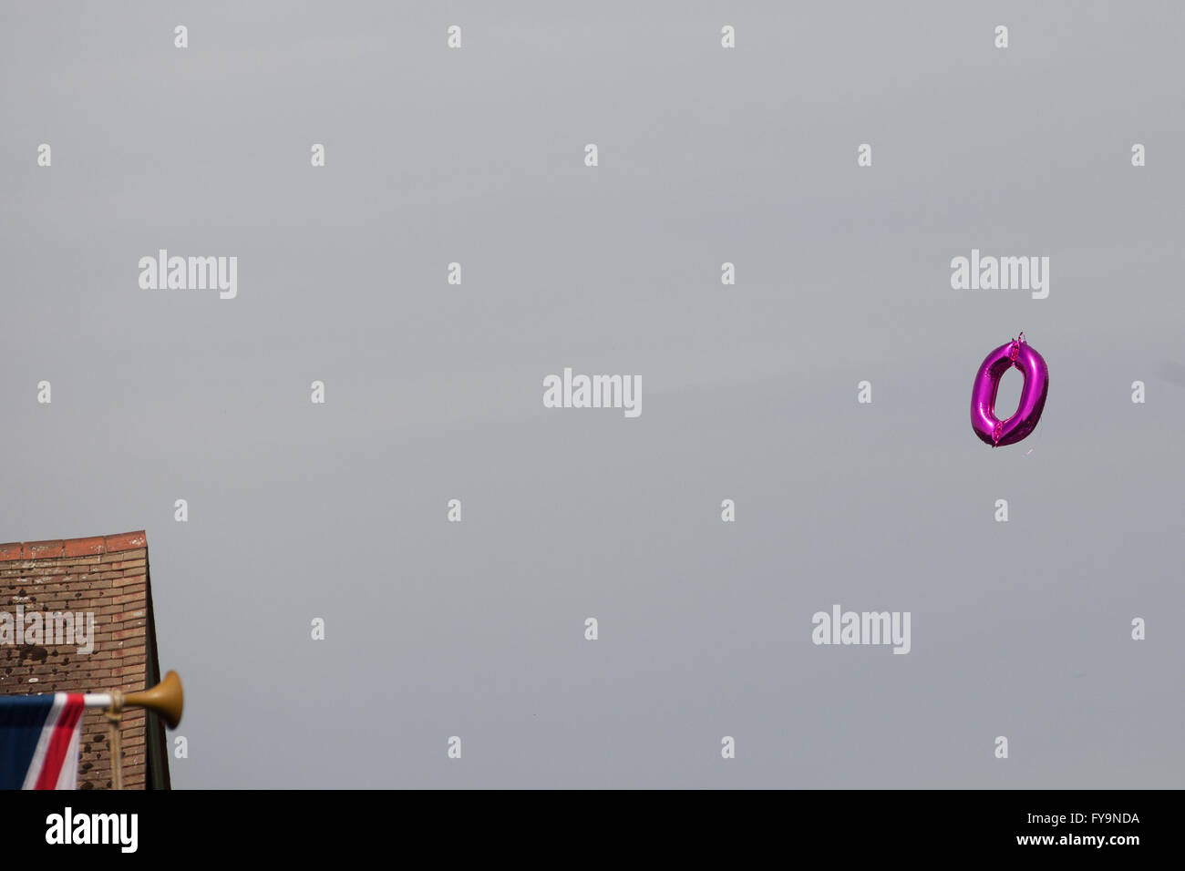 Windsor, UK. 21st April, 2016. A 'zero' balloon floats off into the sky ...