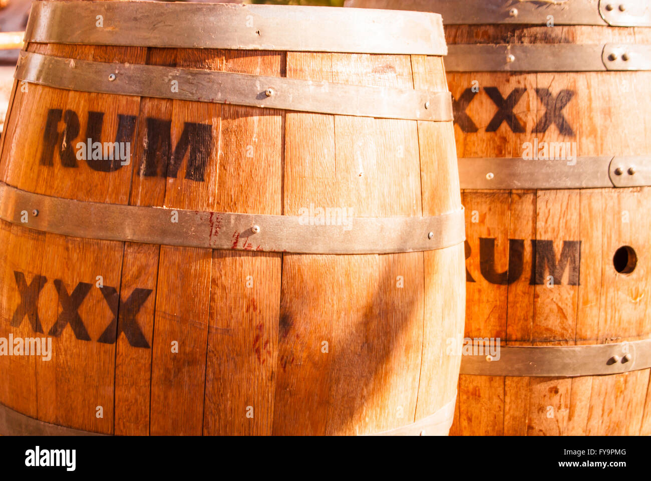 Wooden Rum kegs ringed with metal bands Stock Photo - Alamy