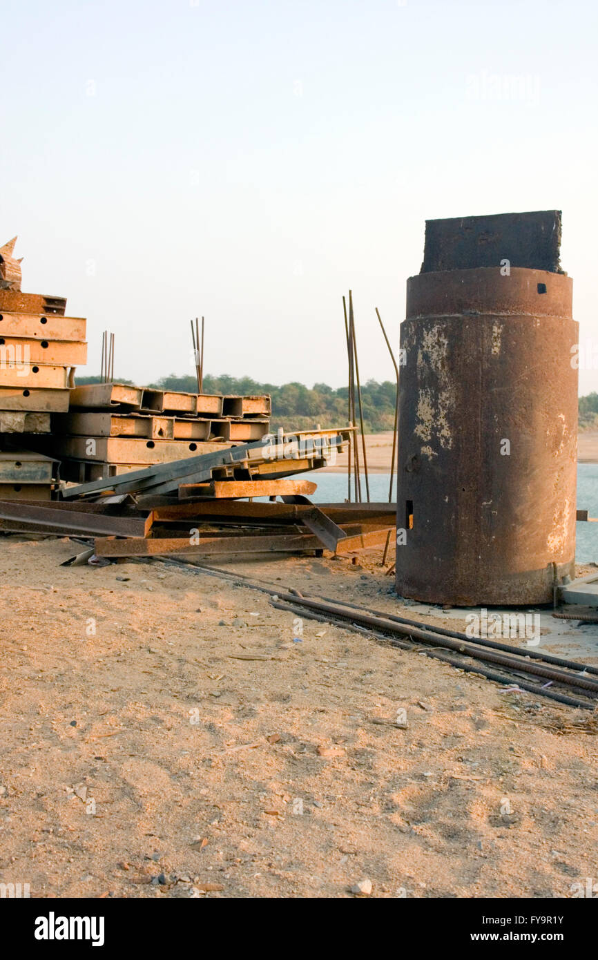 A new bridge is being built to replace a bamboo bridge that crosses ...