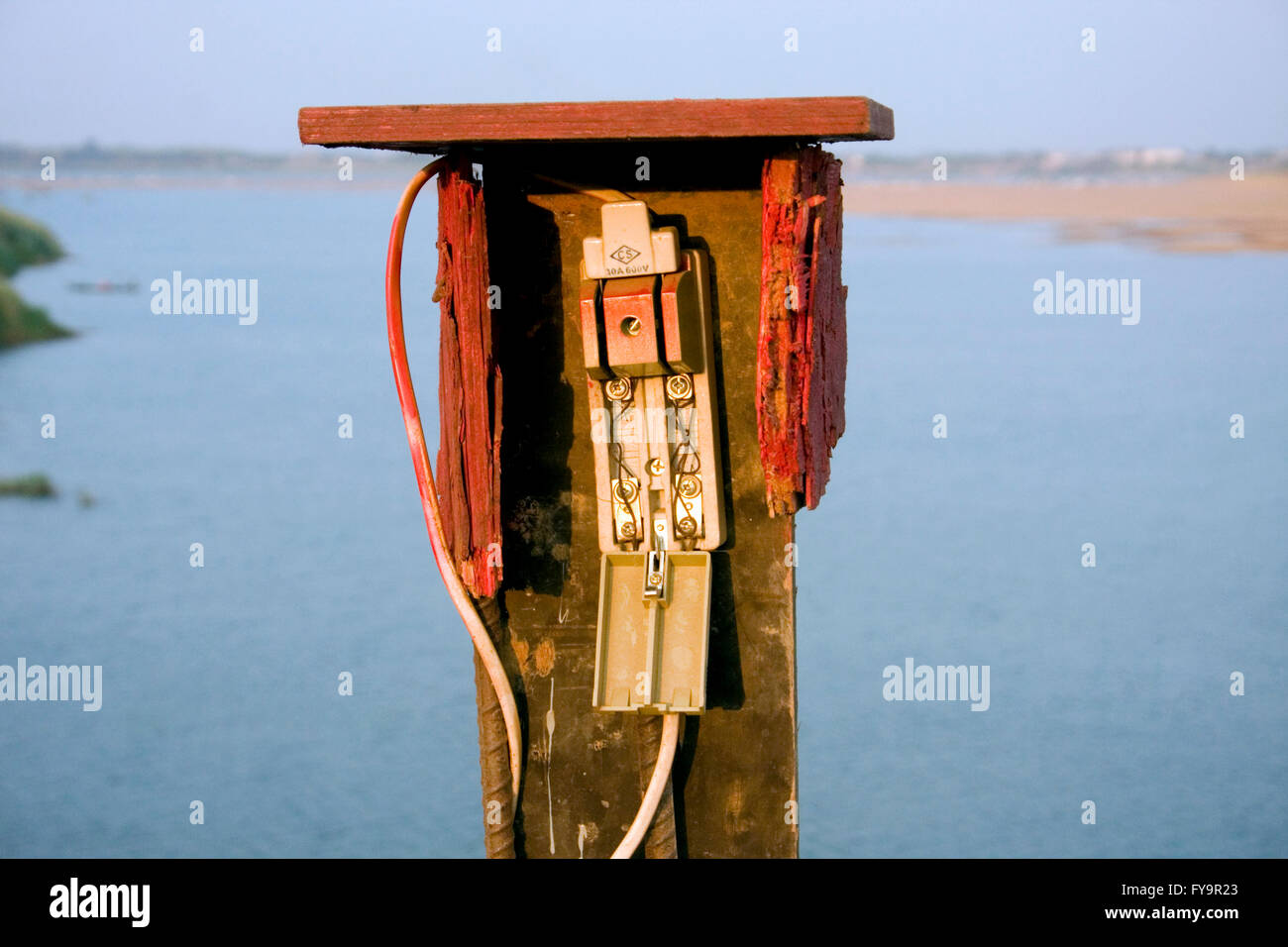 A circuit breaker is mounted on a new steel & concrete bridge being ...