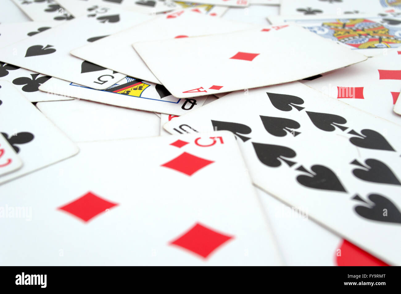 Lot of dusty old playing cards isolated over white background Stock ...