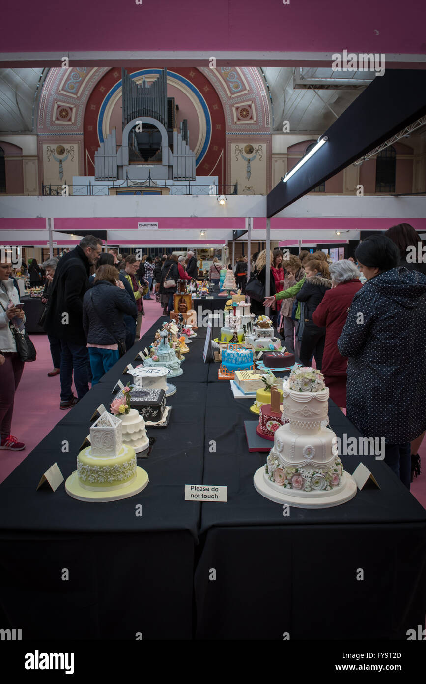 People looking at decorative wedding cakes at Cake International – The ...