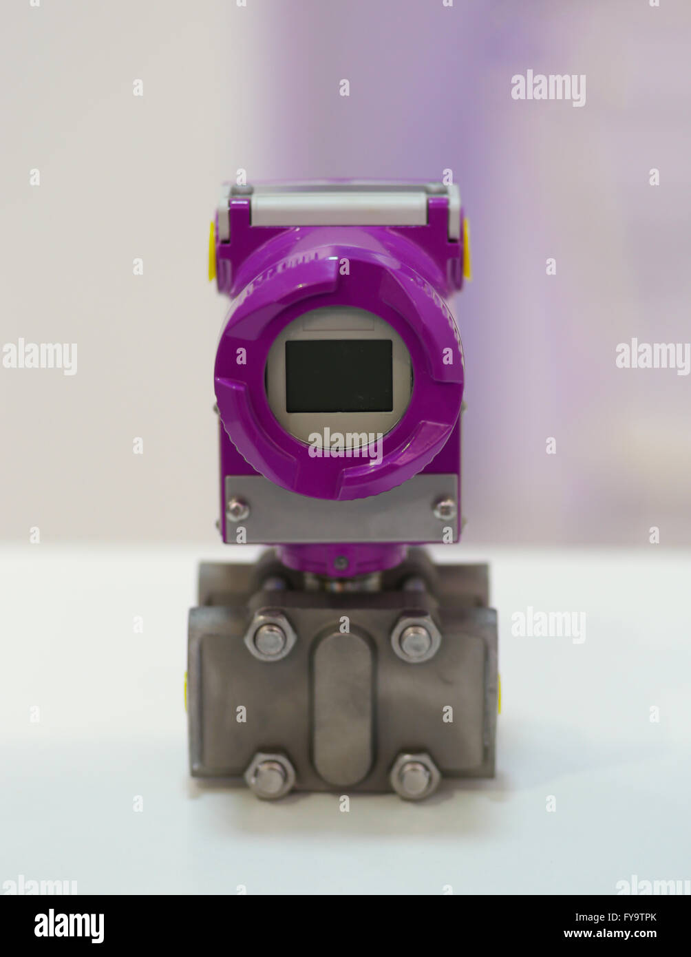 Purple digitalindustrial gas meter high pressure on blurred purple ...