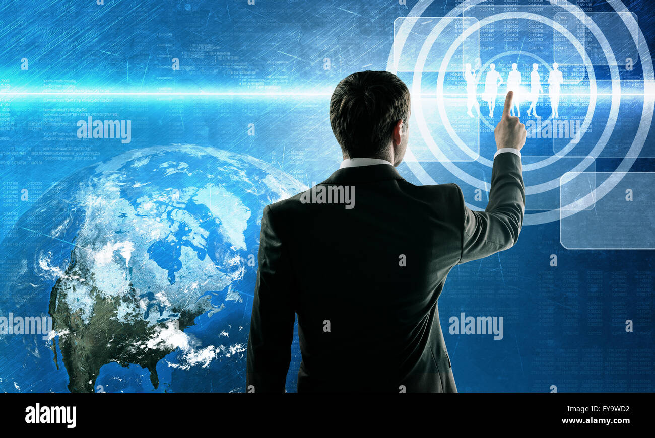 Business man pushing virtual team Stock Photo - Alamy