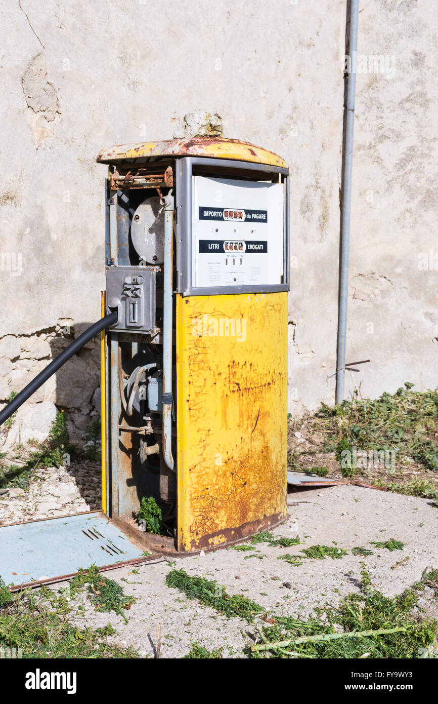 Distributor or gas pump, abandoned. Isolated, old and rusty in a war ...