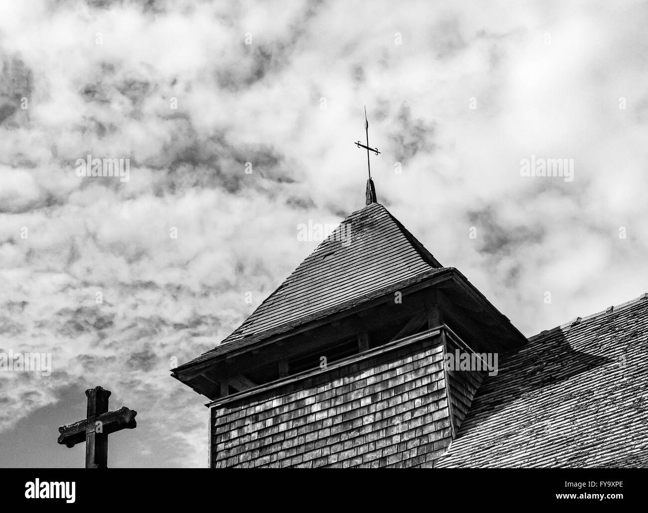 Typically designed English church seen with a small cemetery in the ...