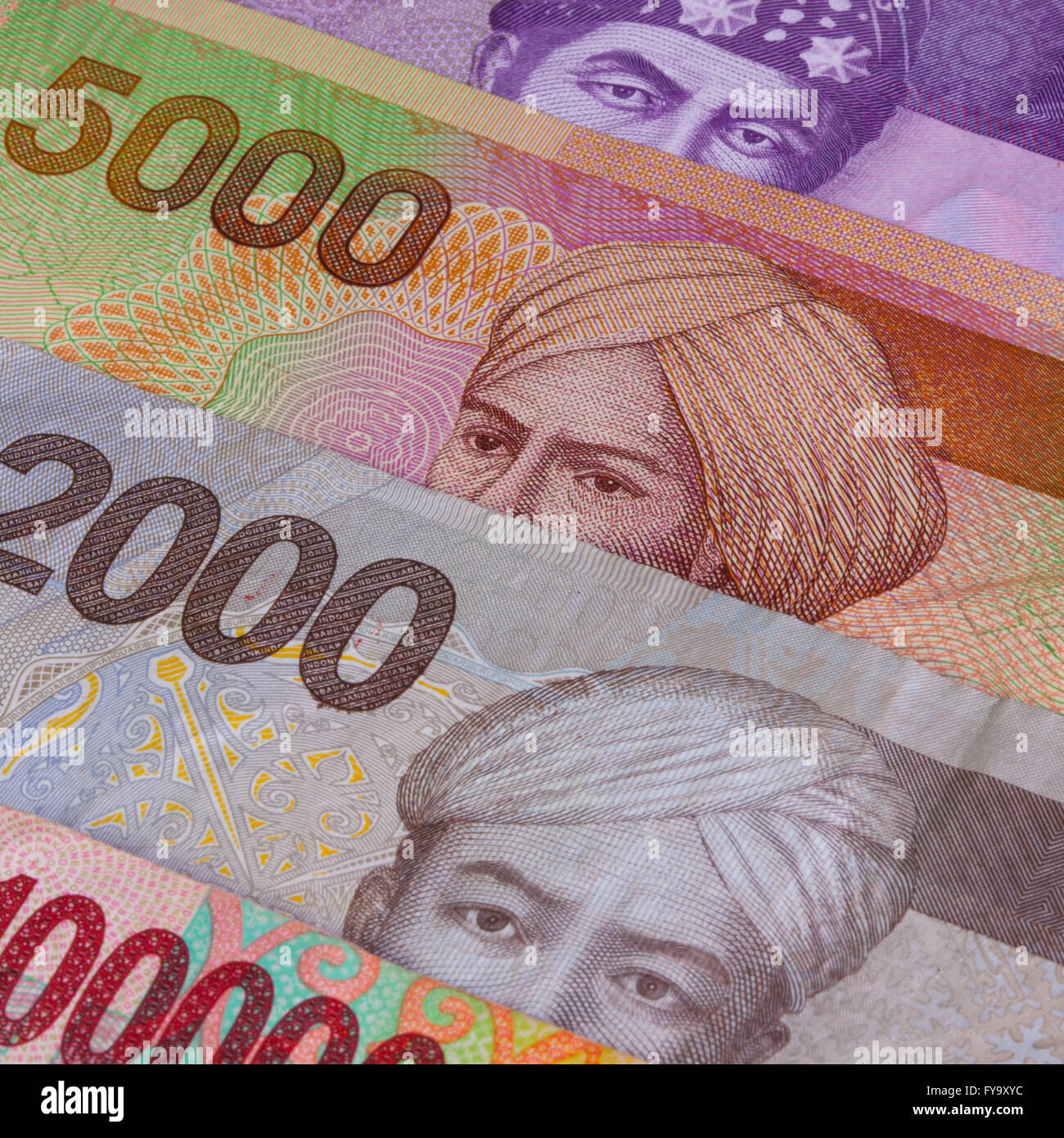 Different Indonesian rupiah banknotes on the table Stock Photo - Alamy